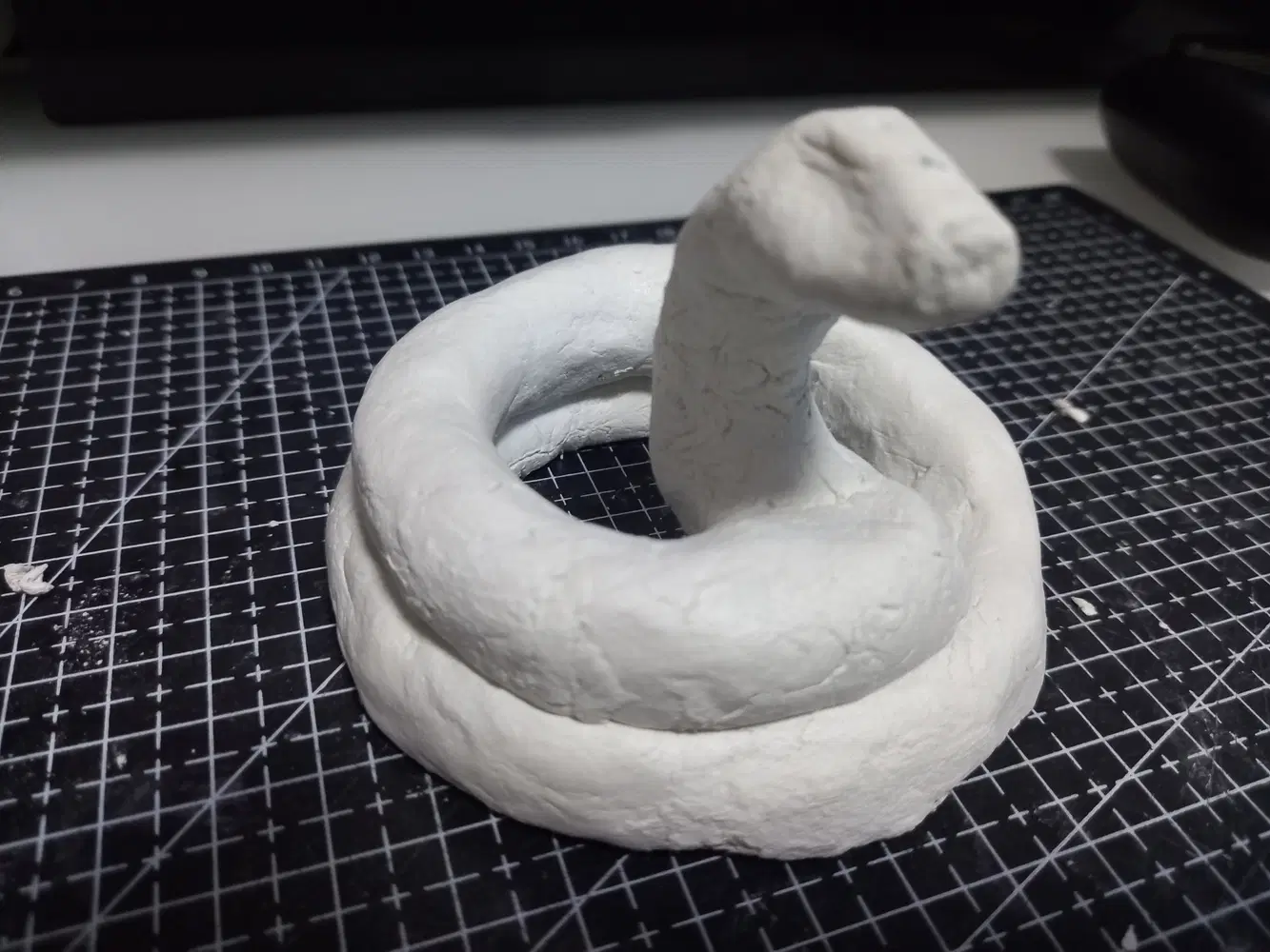 clay snake head