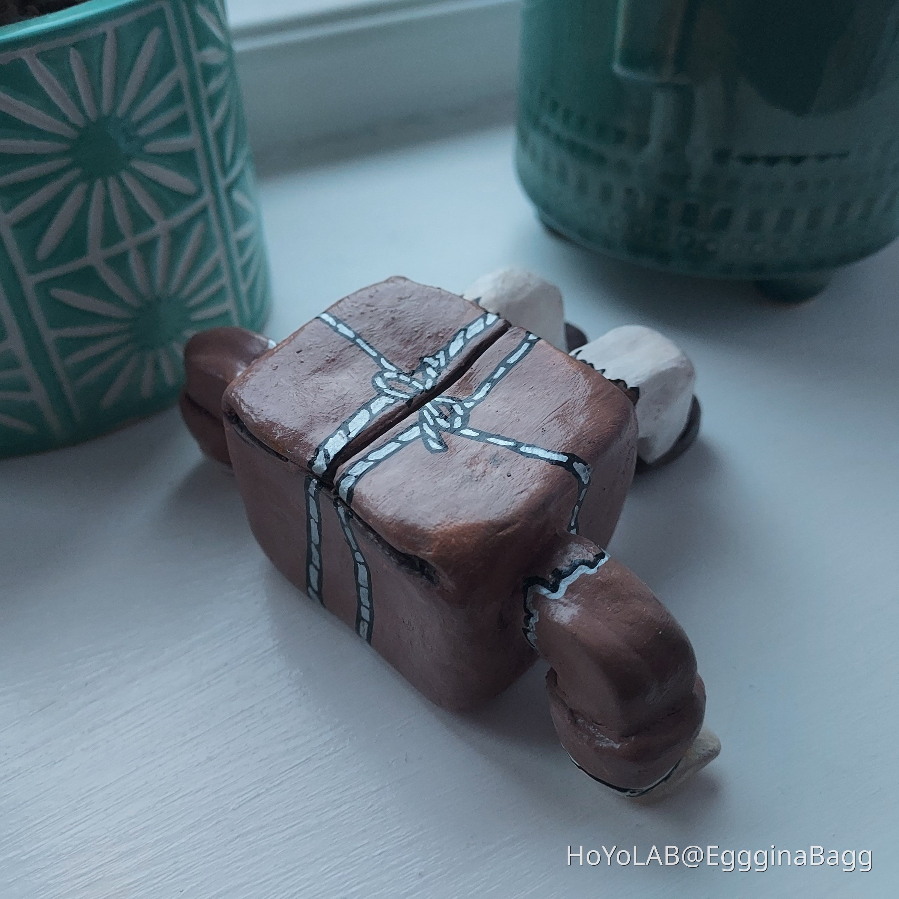 [photos of a silly little Box Dazai statue I made at some point] | HoYoLAB