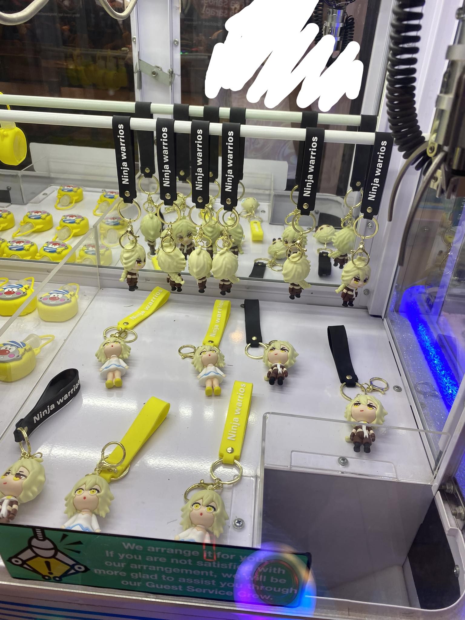 These rip off lumine and aether keychains my friend found in the arcade ...