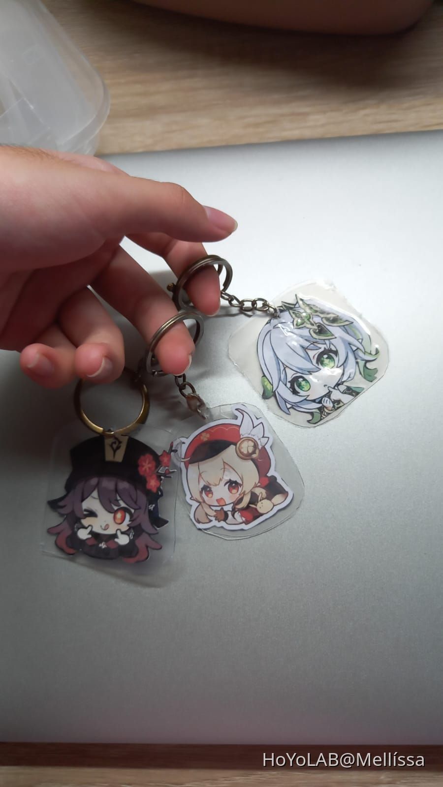 Made some Genshin homemade keychains(and others) , my hand looks so ...