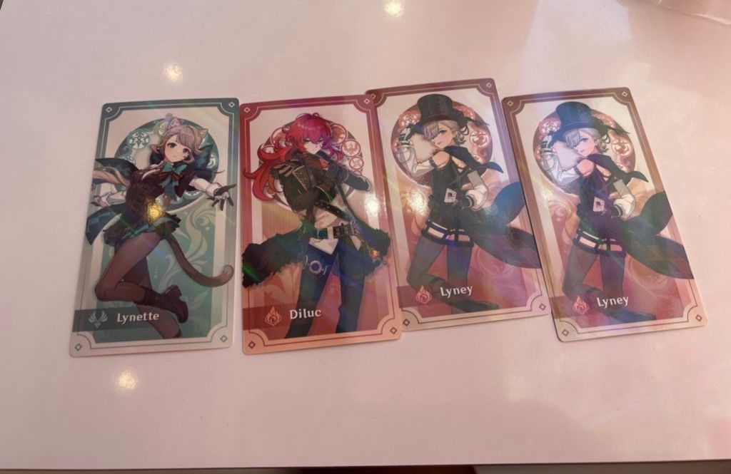 I GOT A DILUC CARD!! 😍 and I love how I managed to get two Lyney cards ...