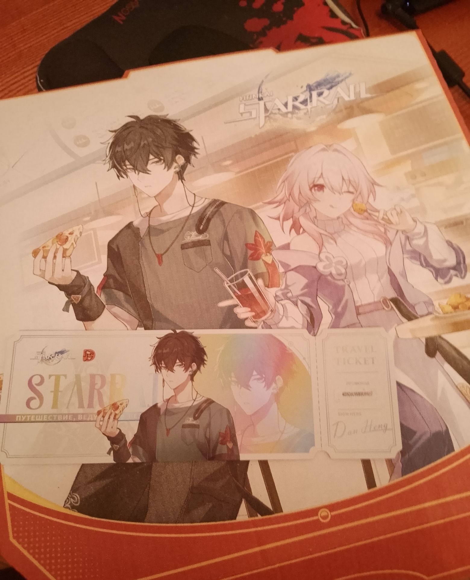 Cool HSR themed pizzer box that I own :3 (And a Dan Heng 'Travel Ticket ...