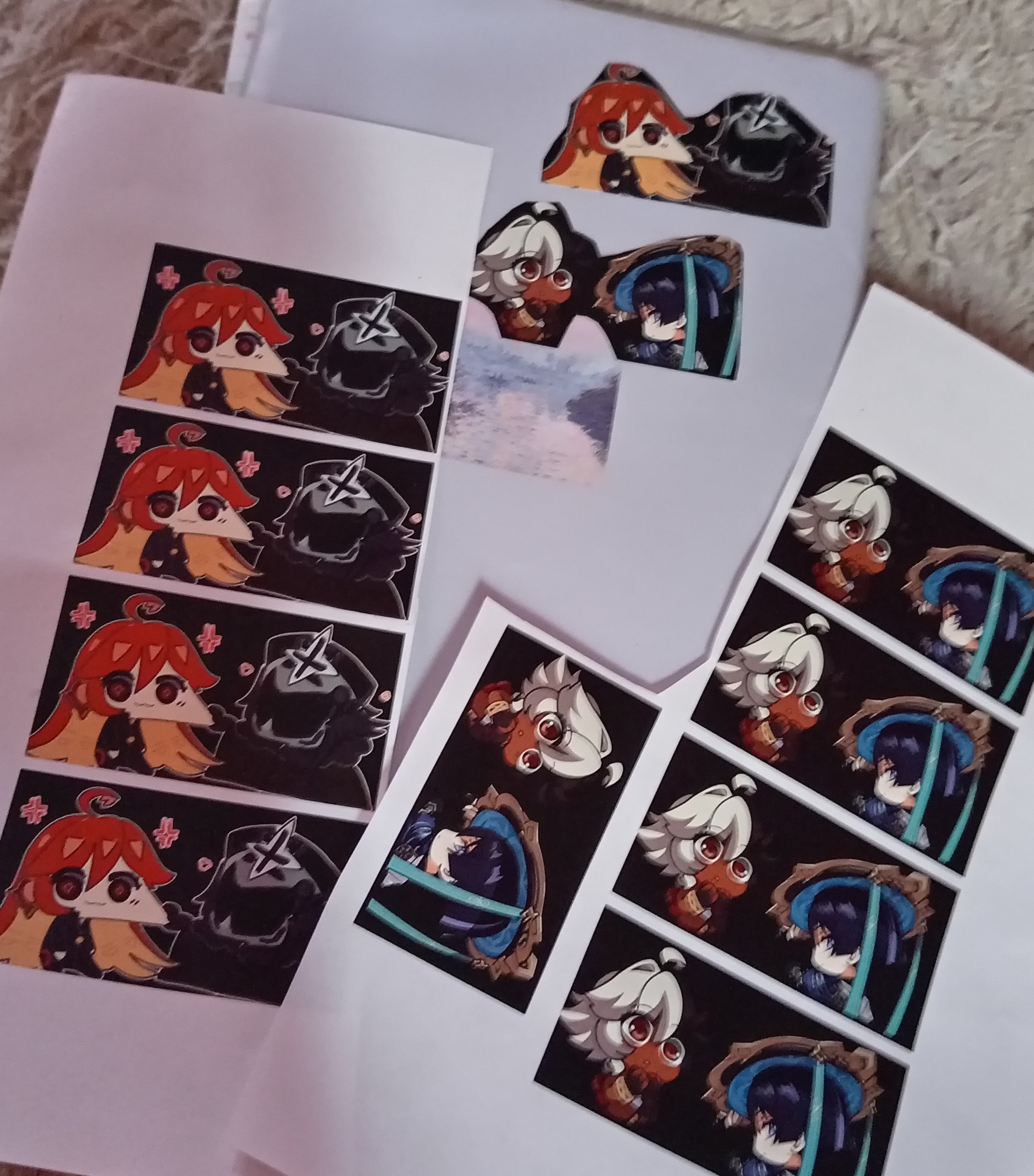 guess who got stickers of her art and favorite Natlan characters ...